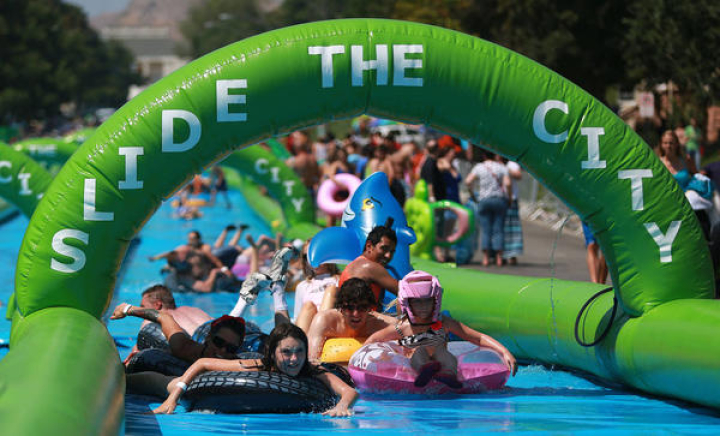 Slide the City Brings Giant Water Slide to Baltimore - Baltimore Magazine